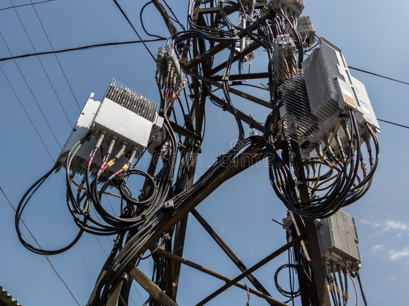 Cluttered Utility Pole with Assortment of Electronic Equipment ...