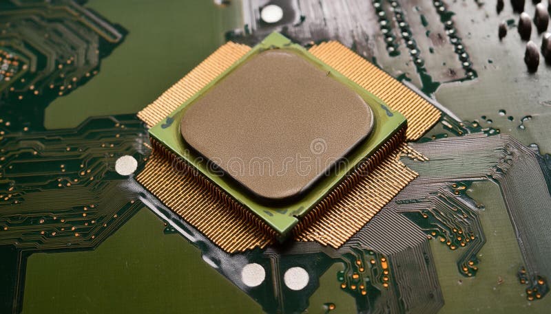 A Detailed View of a CPU on a Green Circuit Board, Symbolizing ...
