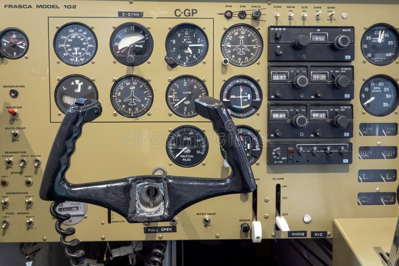 A Detailed View of a Flight Simulator Cockpit, Featuring a Yoke, an ...