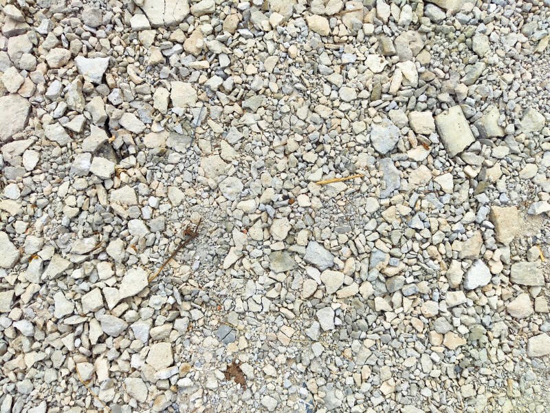 A Detailed View of a Gravel Surface Showcasing Diverse Stone Sizes ...