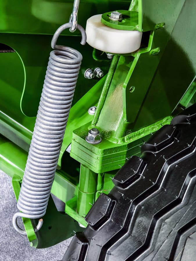 Detailed View of a Green Agricultural Machine Component Highlighting ...