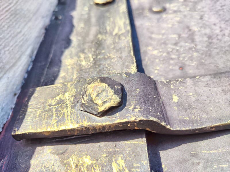 Detailed View of Hand Forged Iron Strap Hinge and Round Rivet. Close-up ...