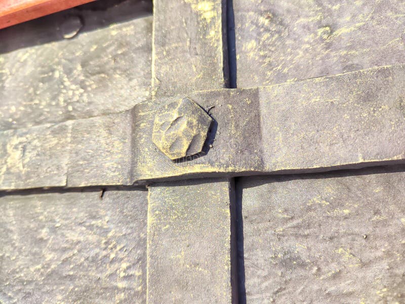 Detailed View of Hand Forged Iron Strap Hinge and Round Rivet. Close-up ...