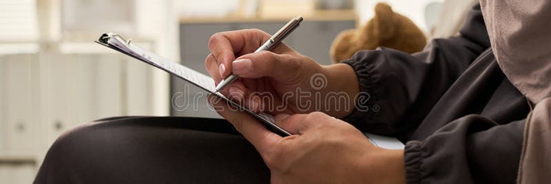 Close-Up of Hands Writing on Clipboard Stock Photo - Image of task ...
