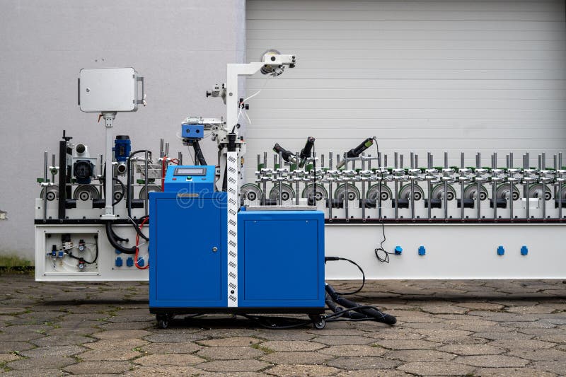 Industrial Machine Assembly with Rotary Components and Control Cabinet ...