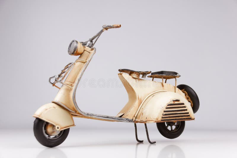 Detailed View of a Motor Scooter Model Combined with a Puppet Stock ...