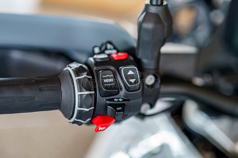 Detailed View of Motorcycle Handlebar Controls Showcasing Buttons for ...