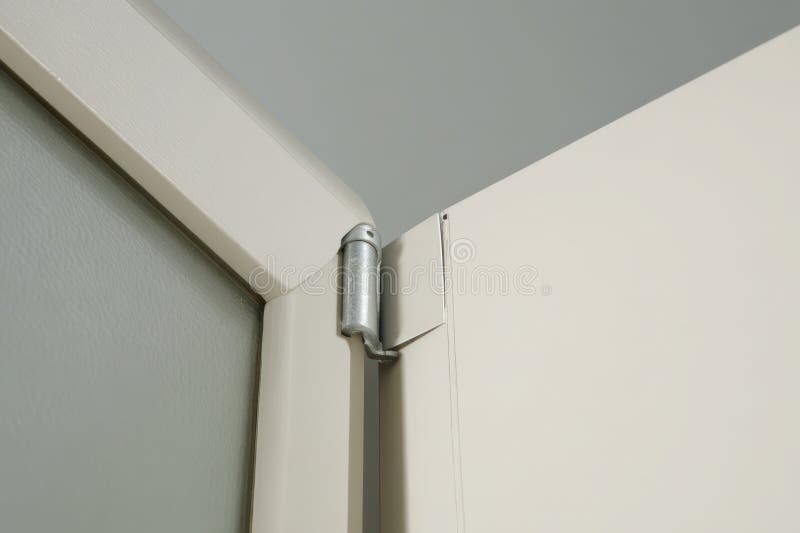 Detailed View of Panel Hinge with Tension Spring Installed in a Modern ...