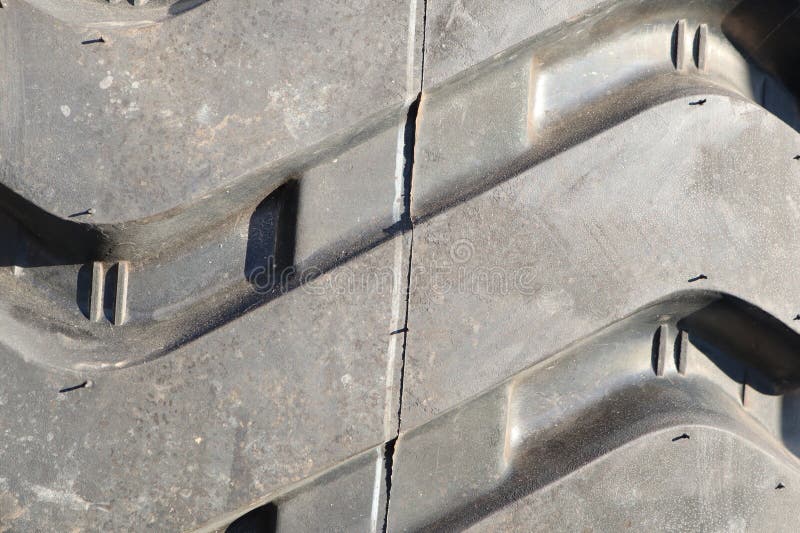 CloseUp of HeavyDuty Tire Tread Pattern and Texture Showcasing Detail ...