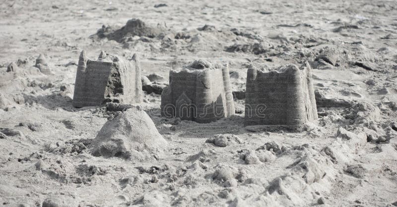 Sandcastle on the Beach stock image. Image of turrets - 377277959
