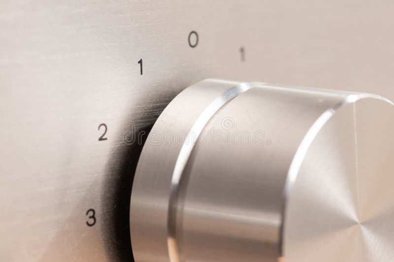 Close-Up of Metallic Control Knob on Appliance Panel with Engraved ...
