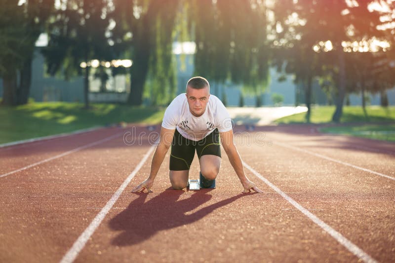 Detailed View of a Sprinter Getting Ready To Start. Selective Focus ...
