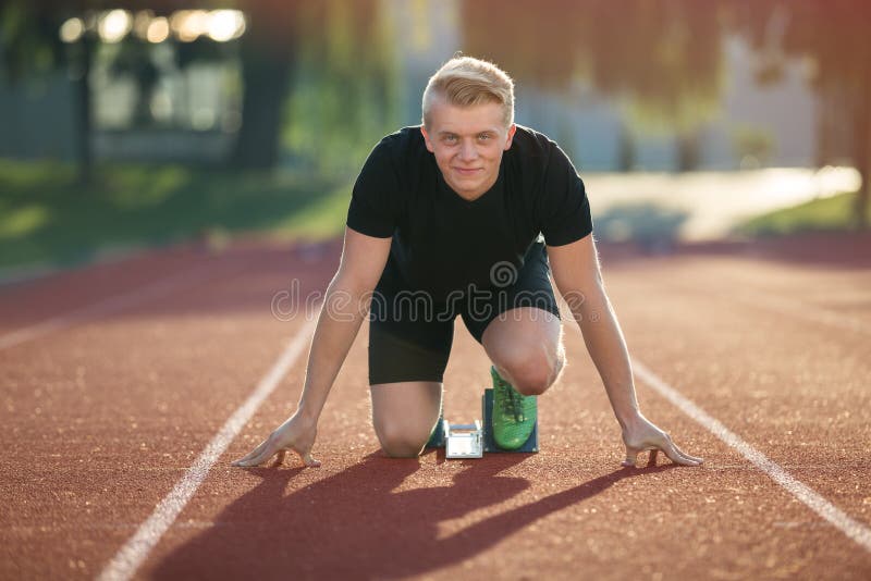 Detailed View of a Sprinter Getting Ready To Start. Selective Focus ...