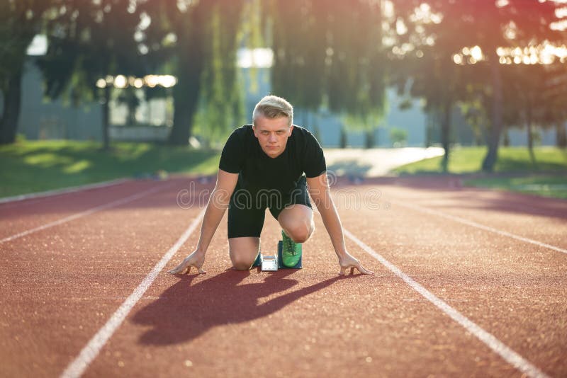 Detailed View of a Sprinter Getting Ready To Start. Selective Focus ...