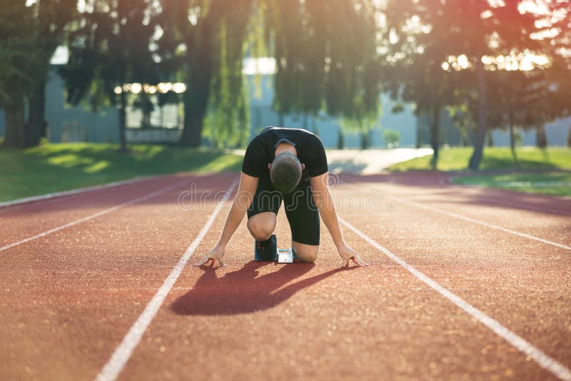 Detailed View of a Sprinter Getting Ready To Start. Selective Focus ...