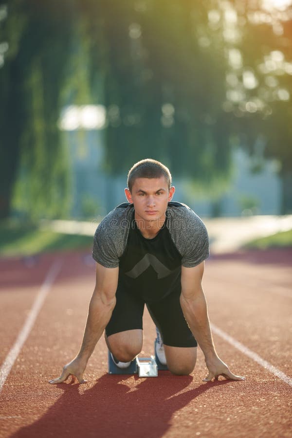 Detailed View of a Sprinter Getting Ready To Start. Selective Focus ...
