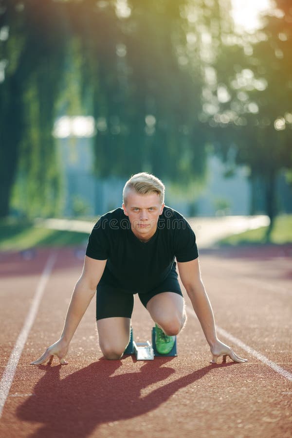 Detailed View of a Sprinter Getting Ready To Start. Selective Focus ...