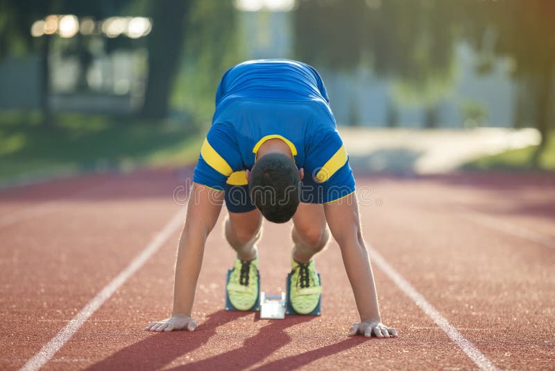 Detailed View of a Sprinter Getting Ready To Start. Selective Focus ...