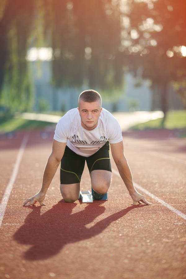 Detailed View of a Sprinter Getting Ready To Start. Selective Focus ...