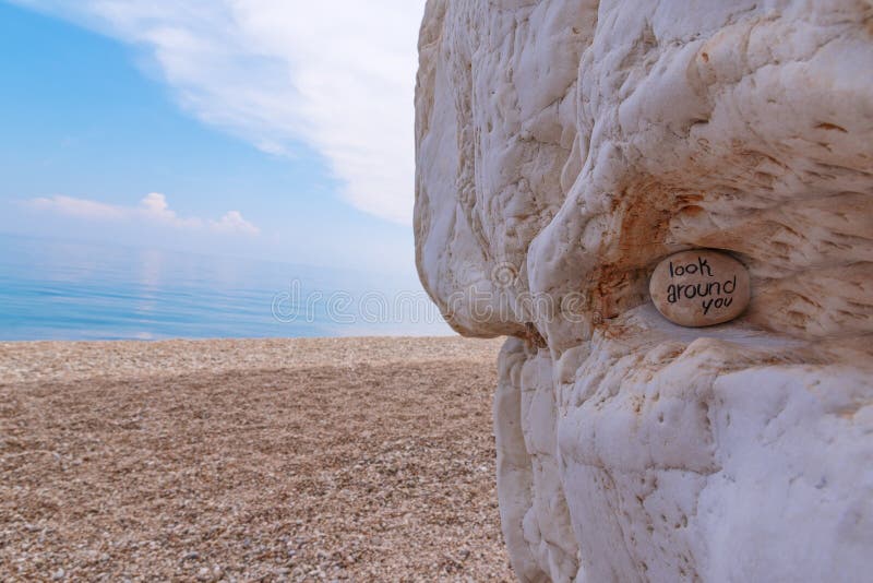 Detailed View of Stone with Sign on the Beach Stock Image - Image of ...
