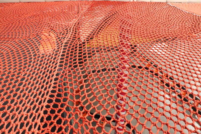 The Red Mesh Netting is Beautifully Placed Over the Surface, Creating a ...