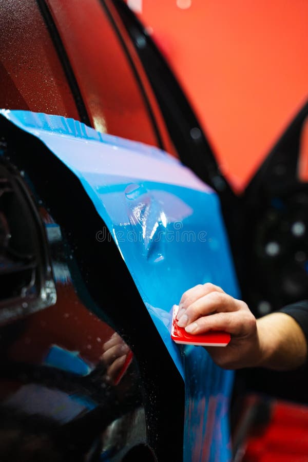 Detailing Expert Uses Red Squeegee Wrapper To Flatten Blue PPF Wrap on ...