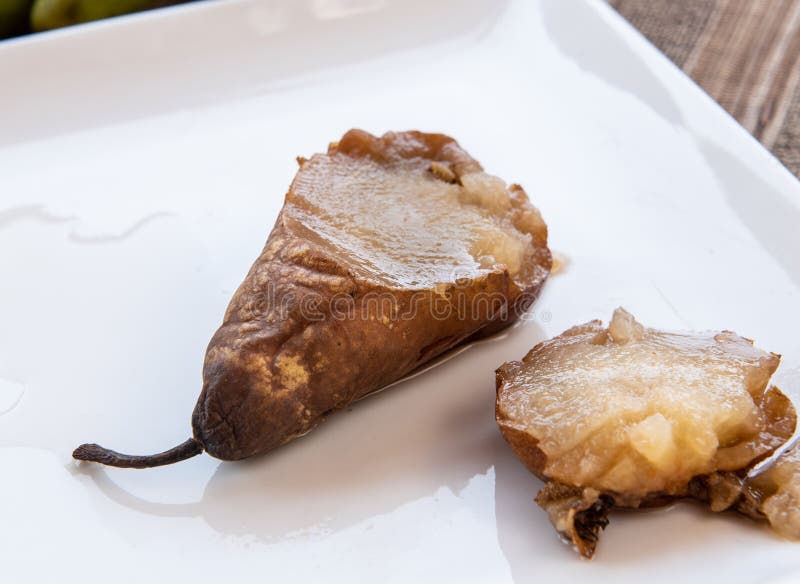 Melted Unhealthy Pear Fruit on a White Plate Stock Image - Image of ...