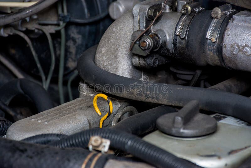 Details of a Dirty Diesel Engine Under the Hood of a Car Stock Photo ...