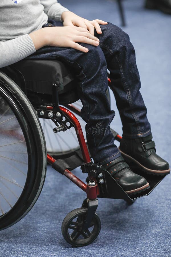 Details of an Ill Disabled Young Boy in a Wheelchair Stock Photo ...