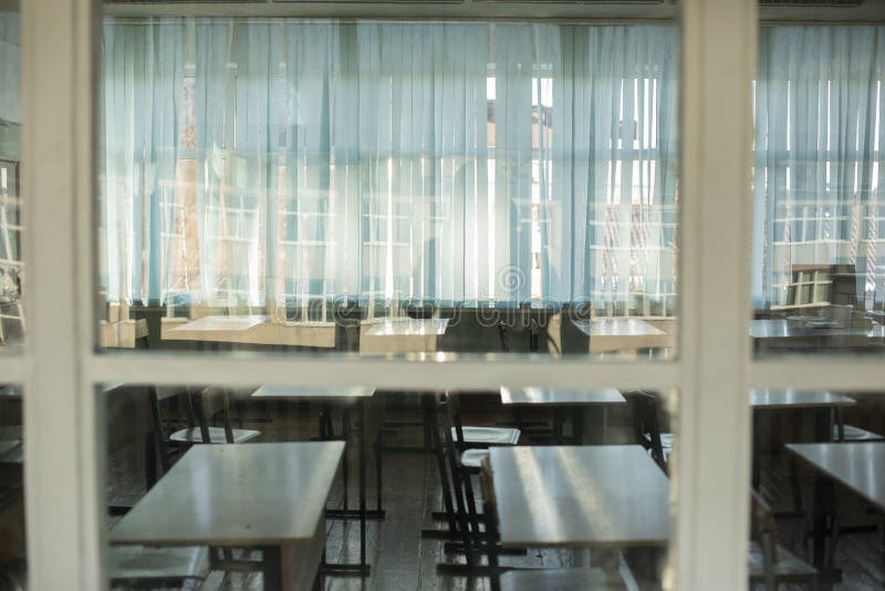 Details of Interior of School. Desks in School Behind Glass Stock Image ...