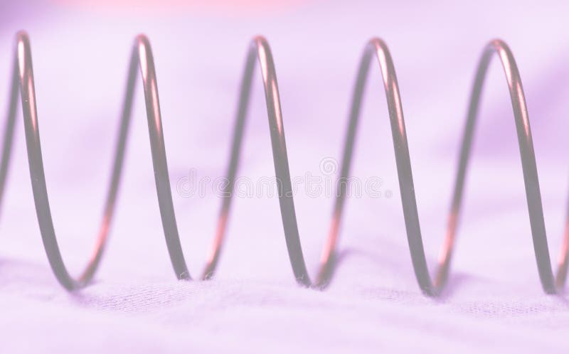 Details of a Metal Spring on Blue Cloth... Stock Image - Image of ...