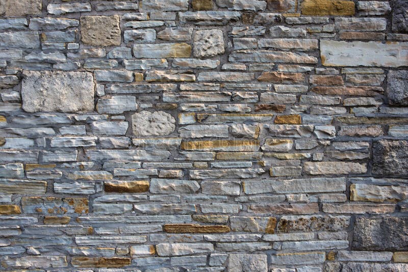 Natural Stone Wall with a Variation in Stone Sizes Stock Photo - Image ...