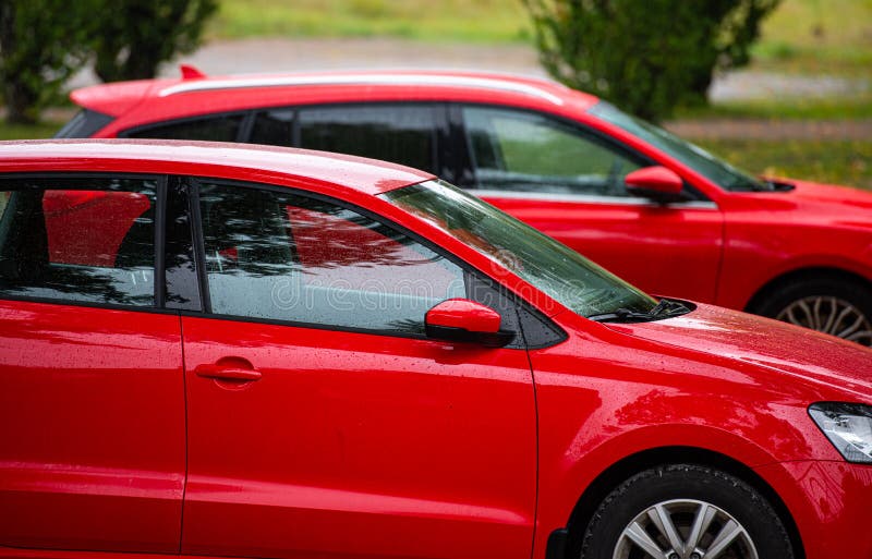 Details of two red cars.. stock image. Image of black - 250222559