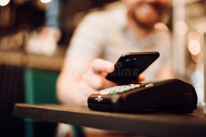 Close Up Details of Wireless Payment, Customer Using Mobile Phone ...