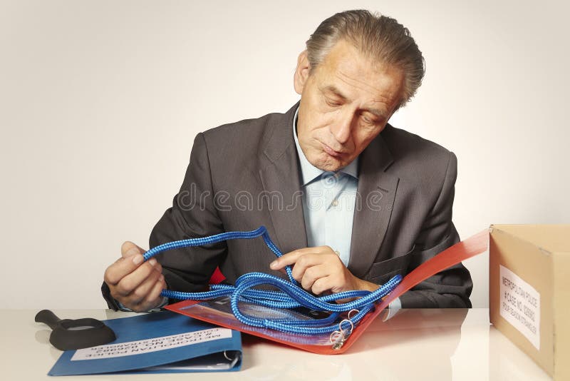 Detective Agent Studying Case and Documentation and Evidences Stock ...