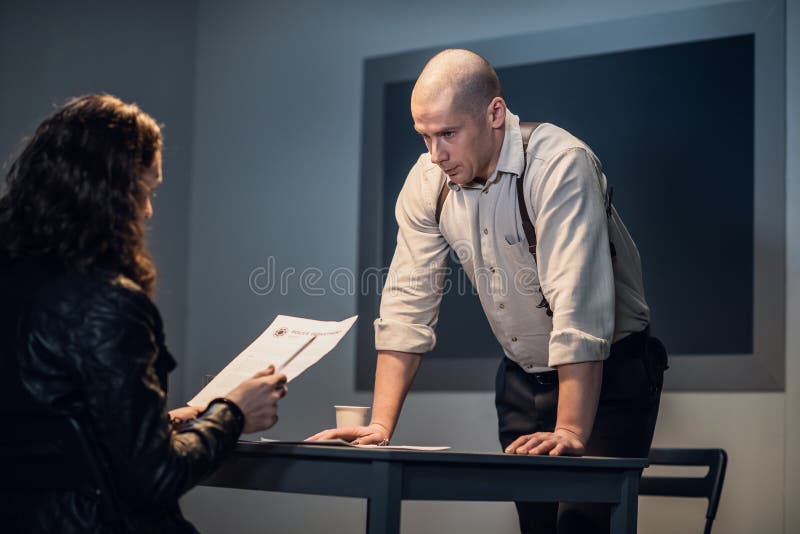 A Young Detective Interviews a Suspect in a Crime Stock Image - Image ...