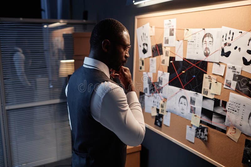 Detective Looking at Evidence Board in Office and Thinking ...