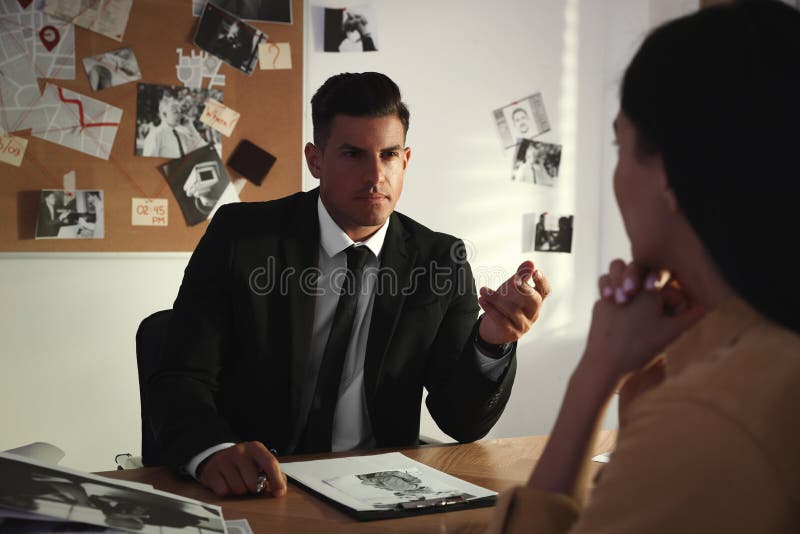 Detective Working with Client in His Office Stock Photo - Image of ...