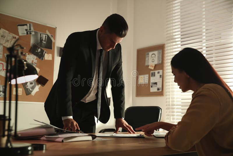 Detective Working at Desk in His Office Stock Photo - Image of board ...