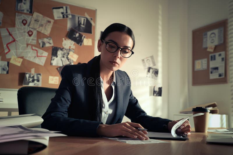 Detective Working At Desk In Her Office Stock Image - Image of laptop ...