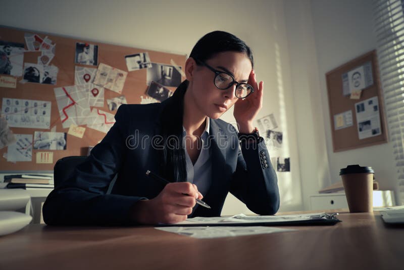 Detective Working at Desk in His Office Stock Photo - Image of board ...