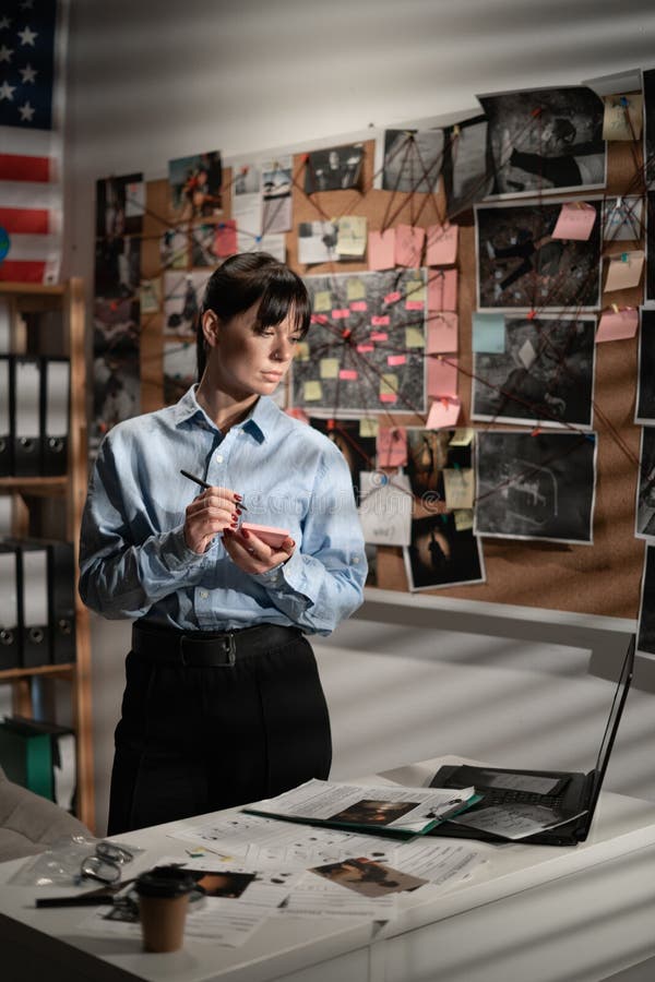 Detective Working at Desk in Her Office Stock Photo - Image of ...