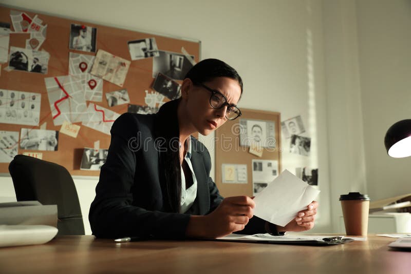 Detective Working at Desk in Her Office Stock Photo - Image of police ...
