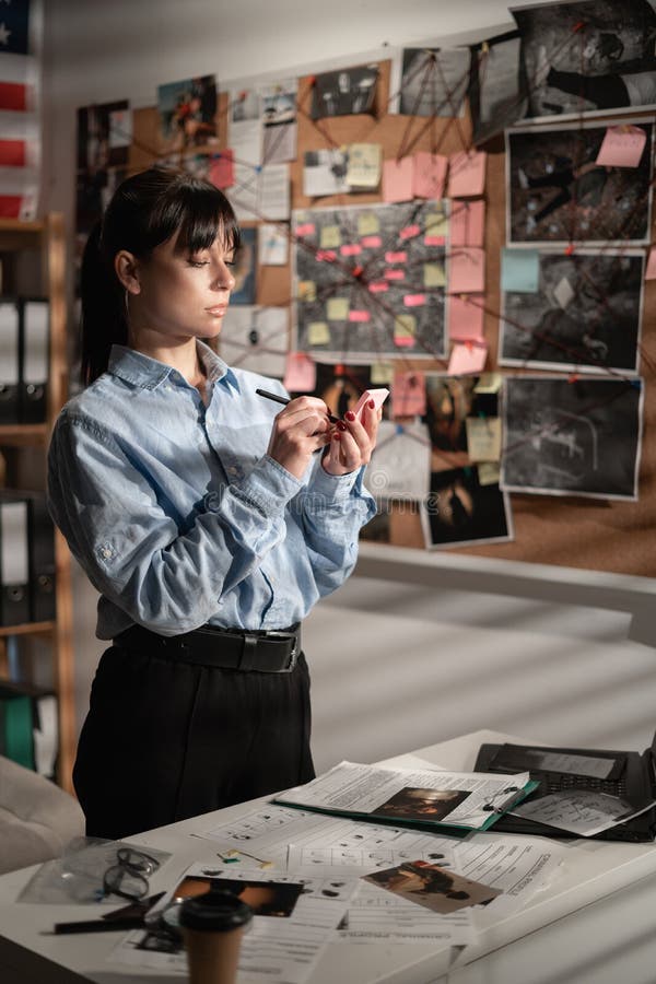 Detective Working at Desk in Her Office Using Laptop Stock Image ...