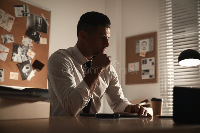 Detective Working at Desk in His Office Stock Photo - Image of business ...