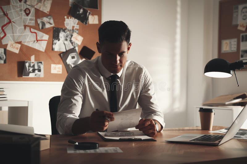 Detective Working at Desk in His Office Stock Photo - Image of board ...