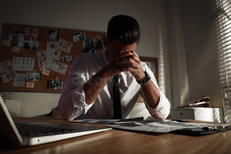Detective Working at Desk in His Office Stock Photo - Image of board ...