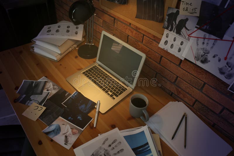 Detective Workplace with Laptop and Documents on Table in Office Stock ...