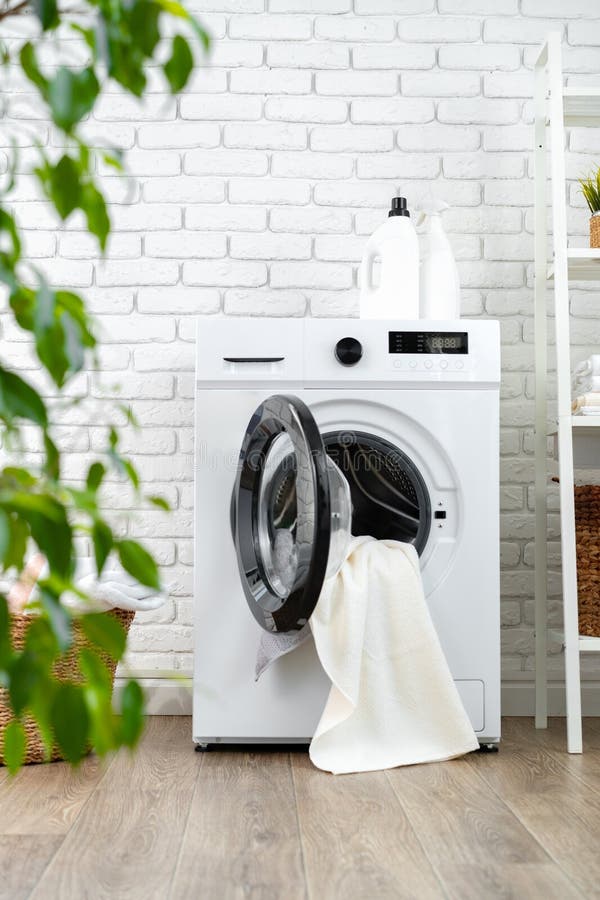 Detergent Bottle on Washing Machine in a Laundry Room Stock Image ...