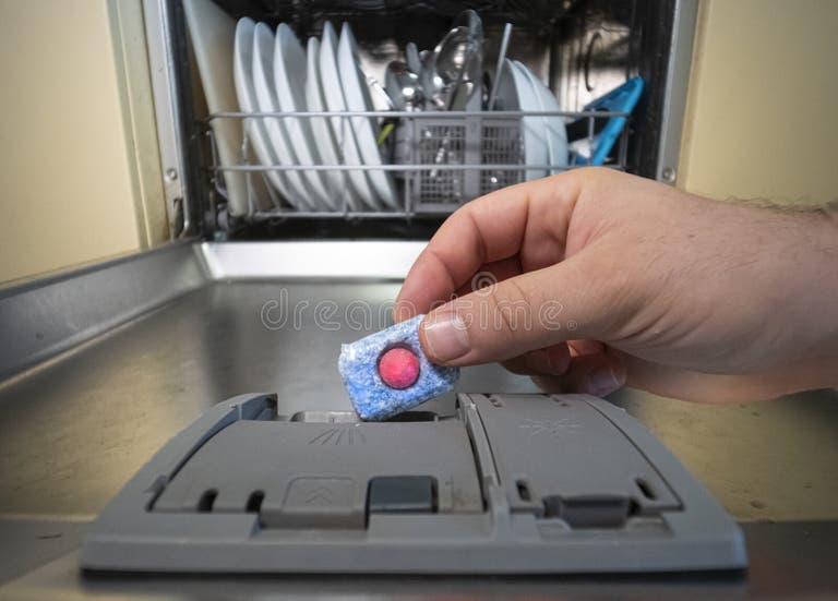 Detergent Tablet for Dish Cleaning Using Dishwasher Stock Photo - Image ...